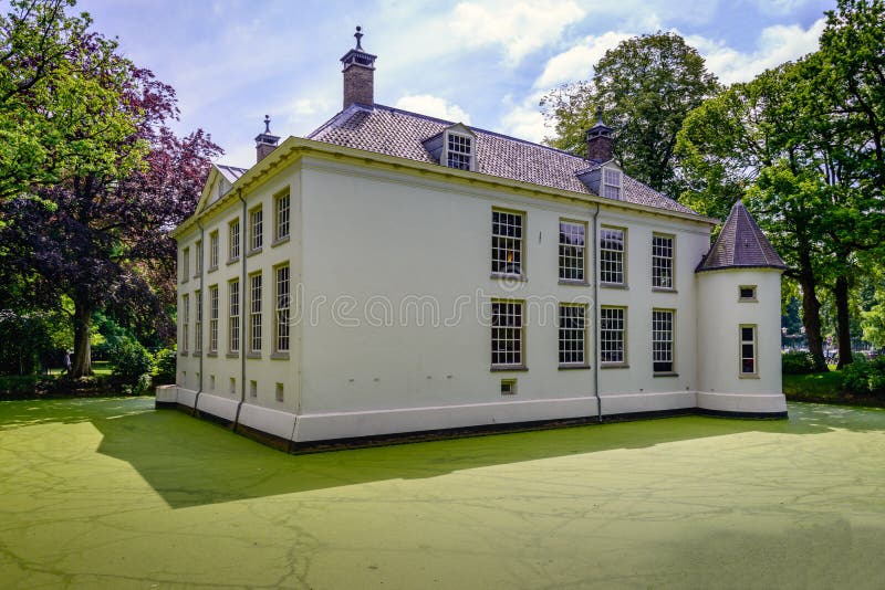 Whitewashed Castle in a Moat Covered with Duckweed Stock Photo - Image ...