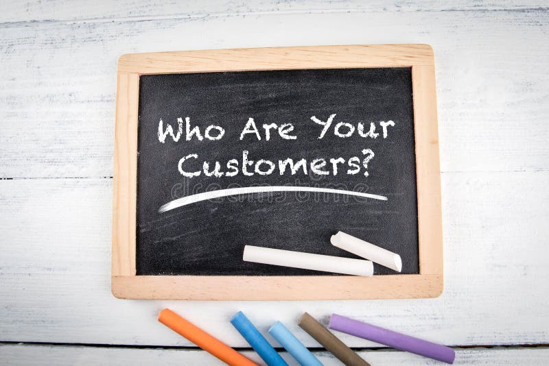 Who are Your Customers. Chalk Board and Colored Chalk Pieces on a White ...