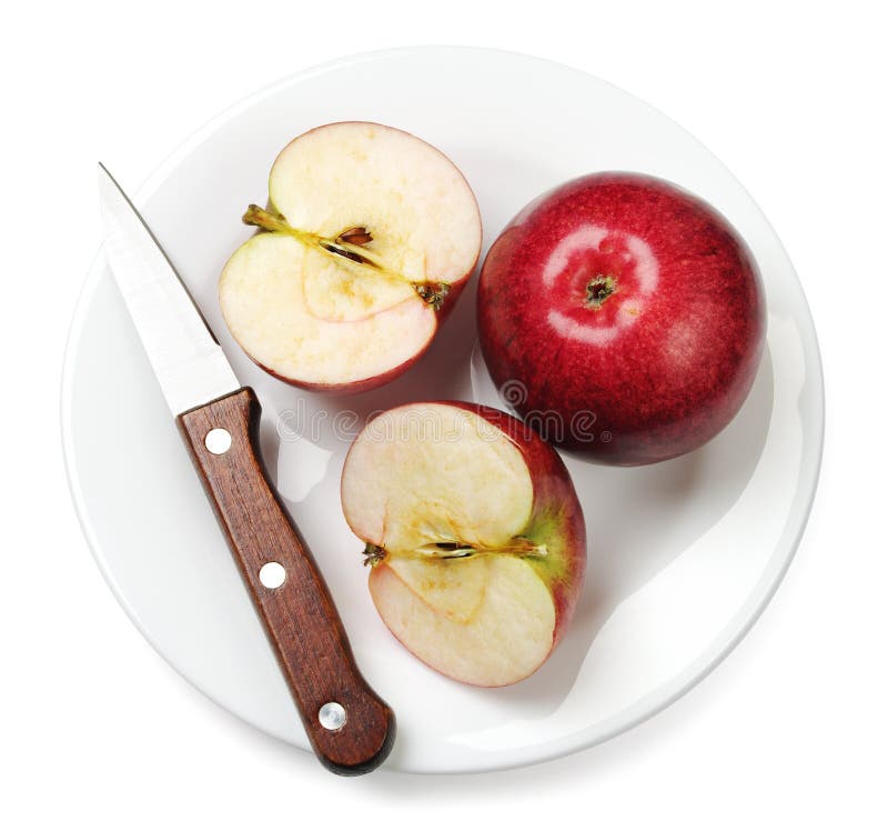 Whole Apple, Halved and a Knife Stock Image - Image of ripe, plate ...