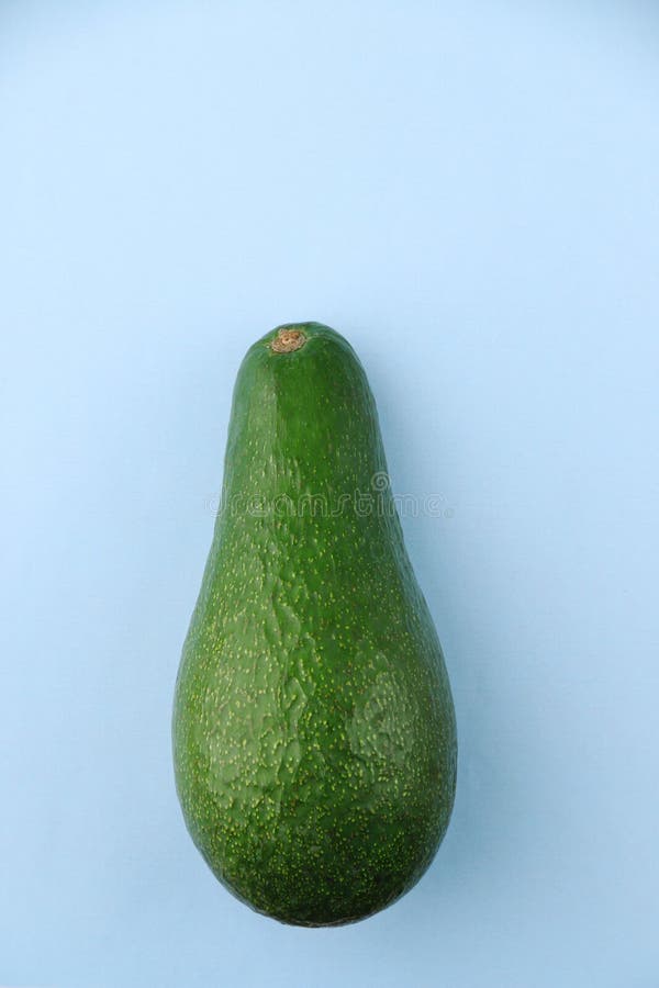 Whole Avocado on a Light Blue Background Stock Image - Image of ...