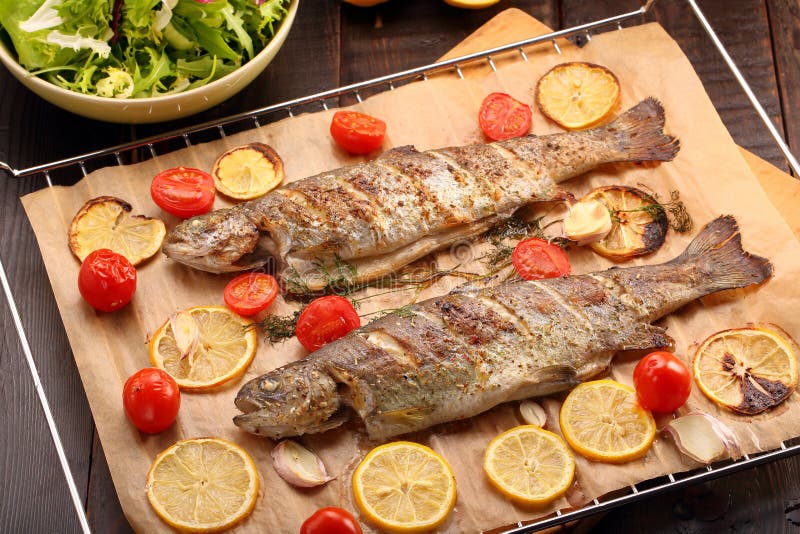 Whole Baked Fish on the Grill Stock Image - Image of delicious, plate ...