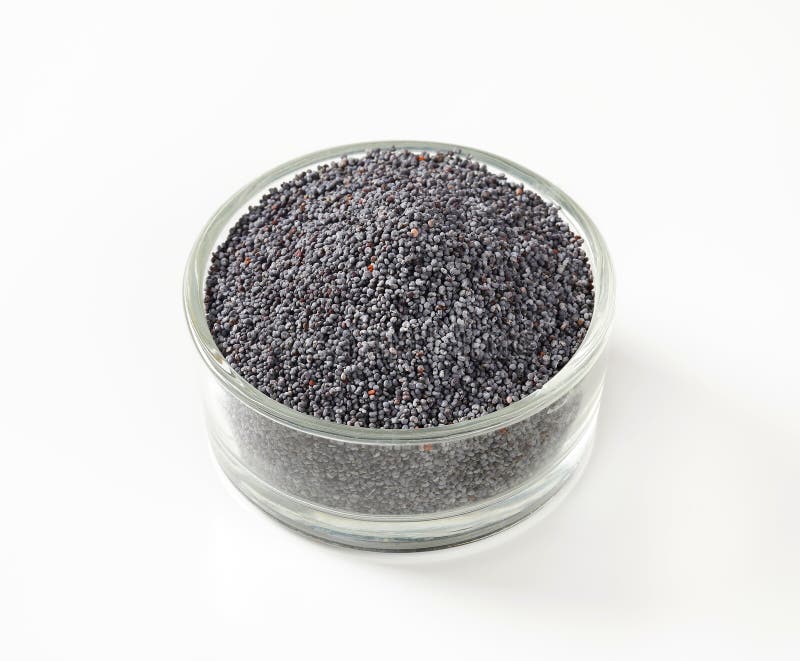 Whole black poppy seeds stock photo. Image of bowl, angle - 90201808