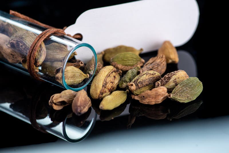 Whole Cardamom and Broken Next To Test Tube and Cork Stock Image ...