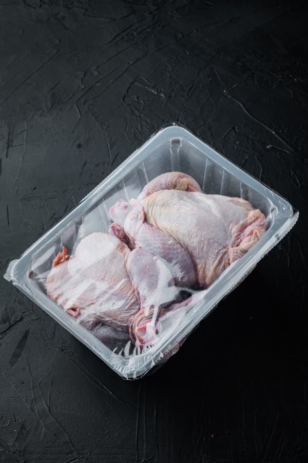 Whole Chicken Meat Package, on Black Background with Copy Space for ...