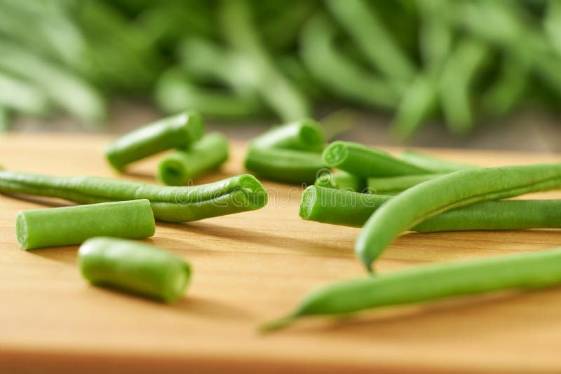 Whole and Chopped Green Beans on a Cutting Board, Close Up Stock Photo ...