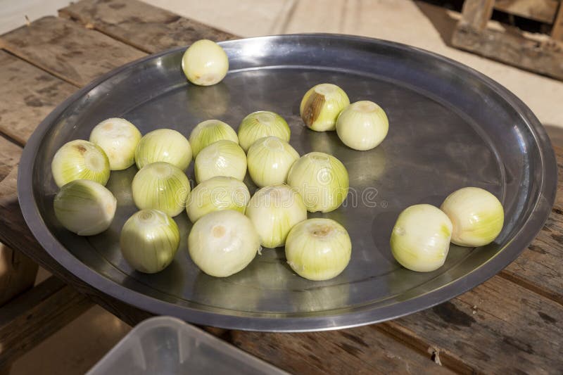 Whole Cleaned Onions Rest on a Steel Platter. Stock Image - Image of ...