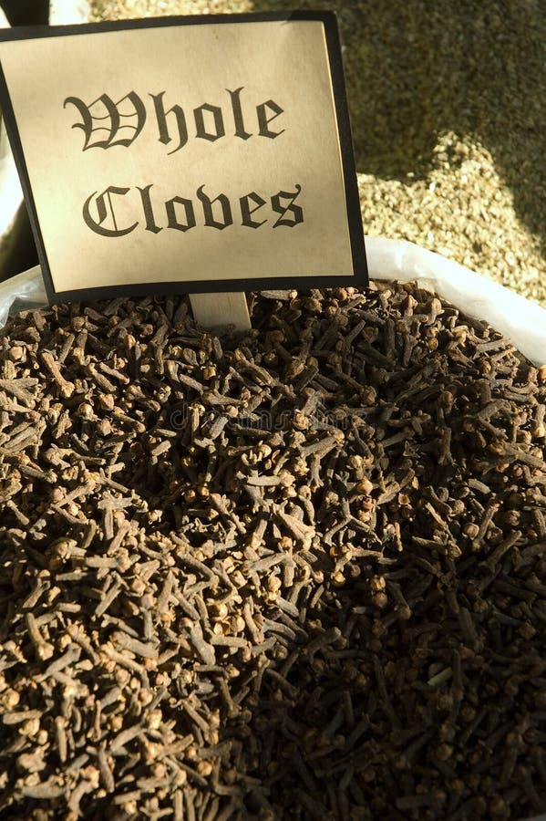 Whole cloves in jar stock photo. Image of stalk, buds - 58537208