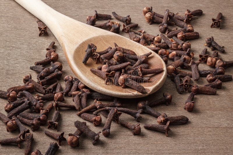 Whole Cloves and Wooden Spoon Stock Image - Image of spoon, cloves ...