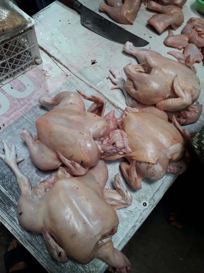 Whole Cut Chickens Line a Table at a Traditional Market Stock Image ...