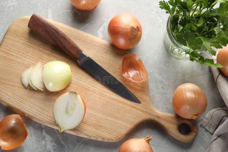 Whole and Cut Onion on Grey Textured Table, Flat Lay Stock Image ...