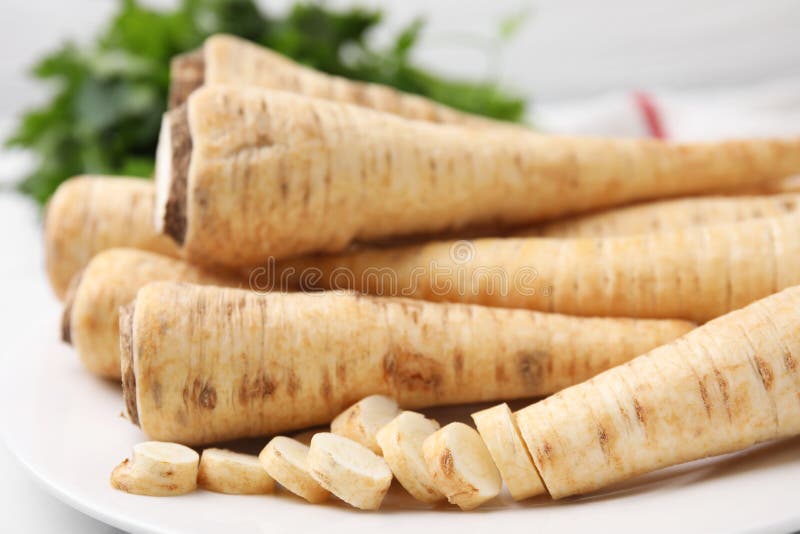 Whole and Cut Parsley Roots on Table, Closeup Stock Image - Image of ...