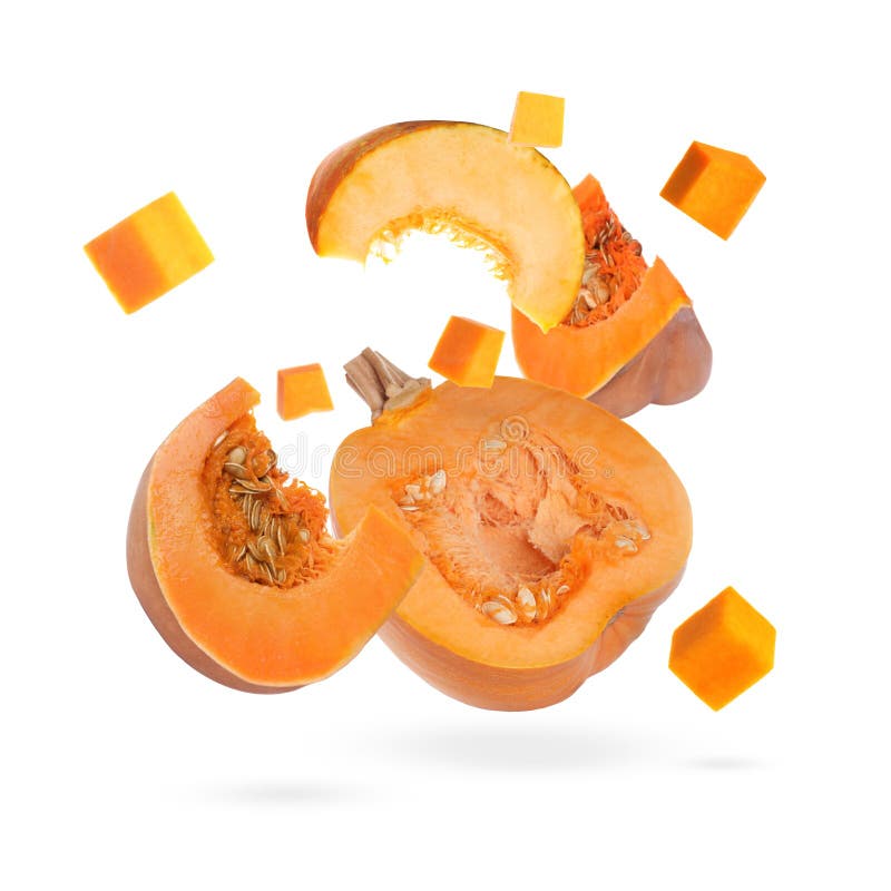 Whole and Cut Pumpkins Falling on White Background Stock Photo - Image ...