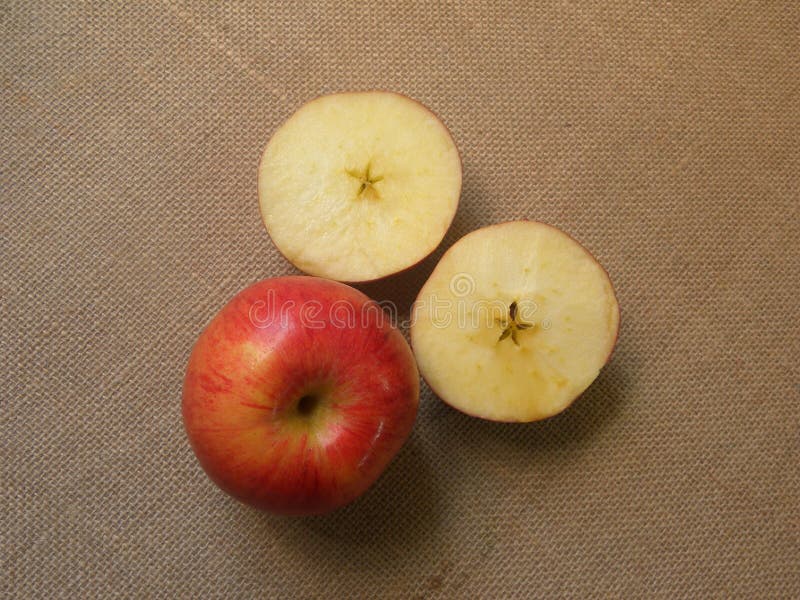 Whole and cut Gala apples stock photo. Image of nutrition - 190288484