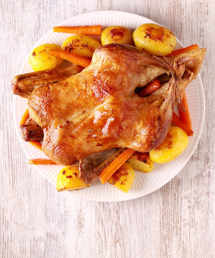 Whole Duck with Potatoes and Carrot Stock Image - Image of meat, copy ...