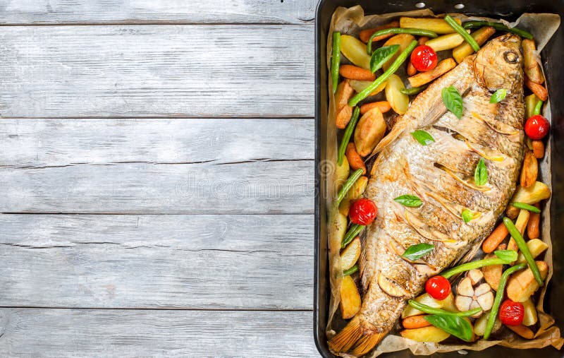 Whole Fish Baked in a Baking Dish, Top View Stock Photo - Image of ...