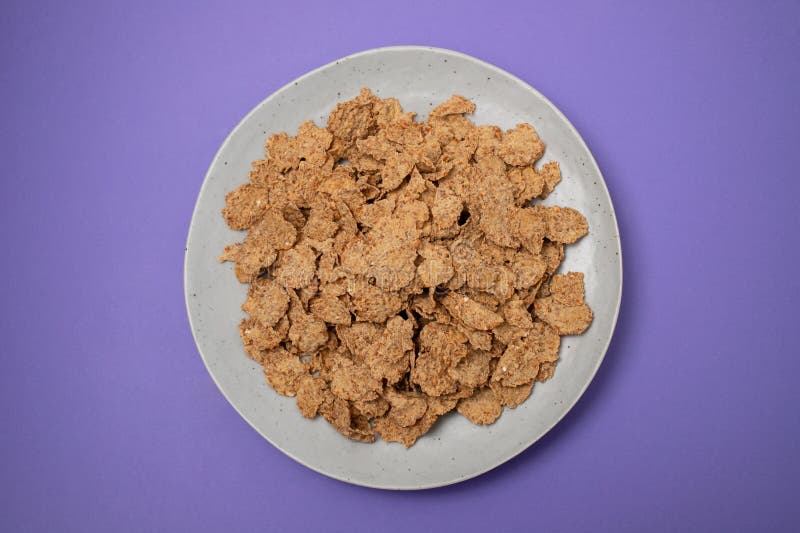 Whole flakes on gray plate stock photo. Image of grain - 330579382