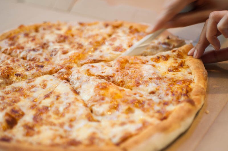 A Whole Four Cheese Pizza on a Dining Table Stock Image - Image of ...