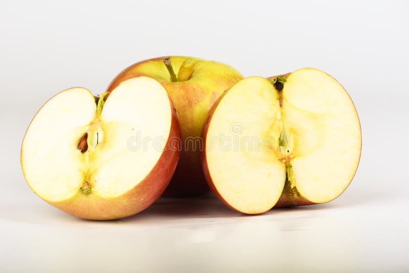 Whole Fresh Apple and Two Halves of Apple Stock Photo - Image of ...