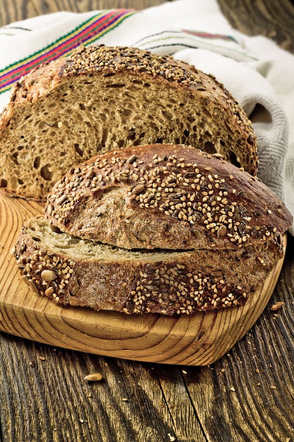 Whole grain bread stock photo. Image of natural, board - 36738710
