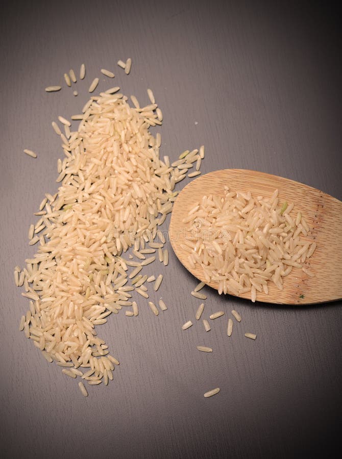 Whole grain brown rice stock photo. Image of brown, staples - 50924340
