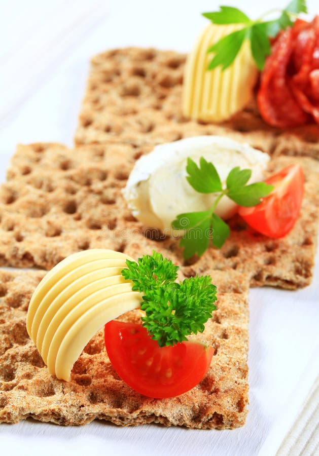 Whole Grain Crispbread with Various Toppings Stock Photo - Image of ...