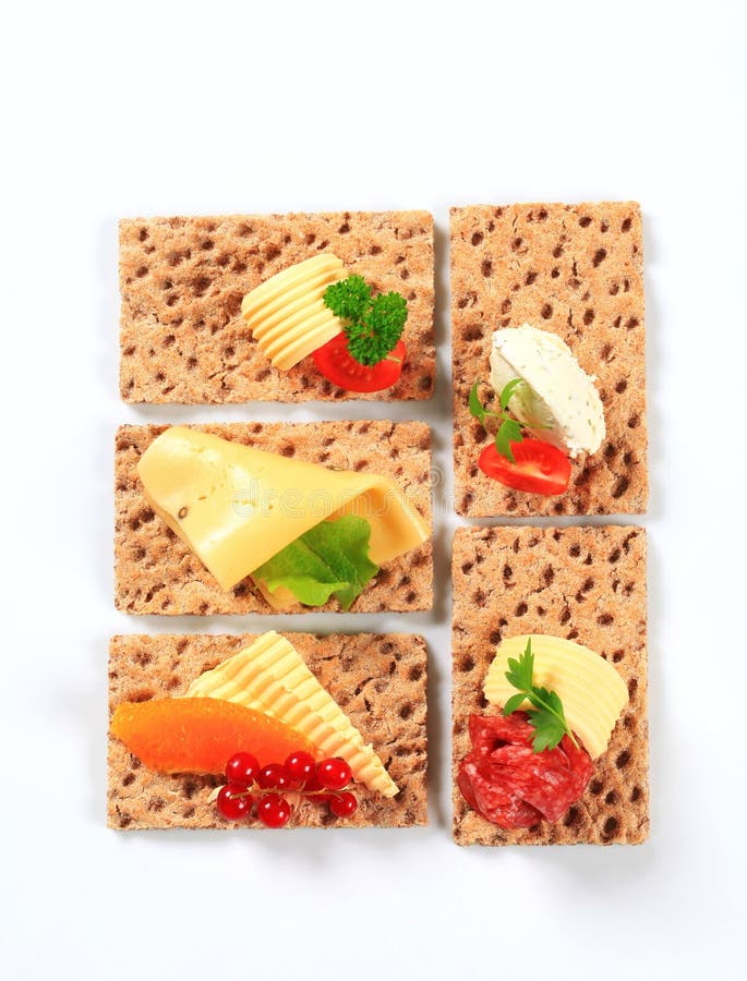 Whole Grain Crispbread with Various Toppings Stock Photo - Image of ...