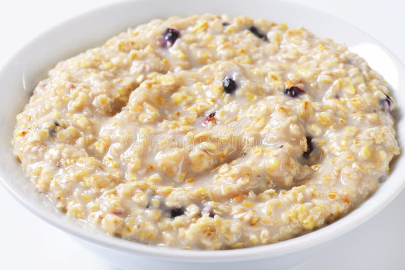 Whole grain oat porridge stock photo. Image of porridge - 57353226