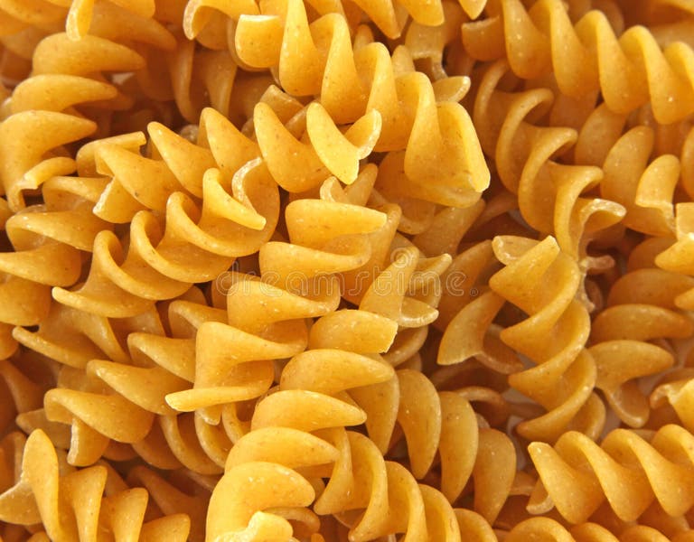 Whole grain Rotini pasta stock photo. Image of yellow - 9215324