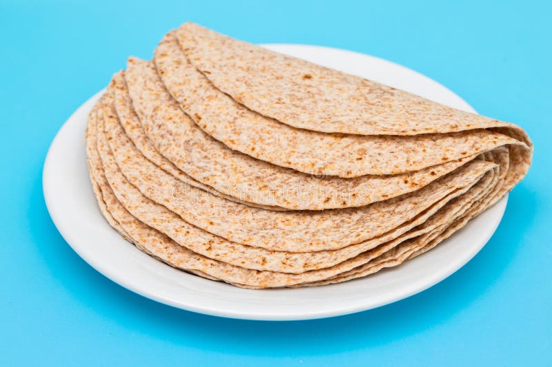 Whole Grain Tortilla Wraps on White Plate Stock Image - Image of wrap ...