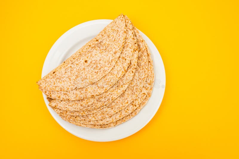 Whole Grain Tortilla Wraps on White Plate Stock Image - Image of circle ...