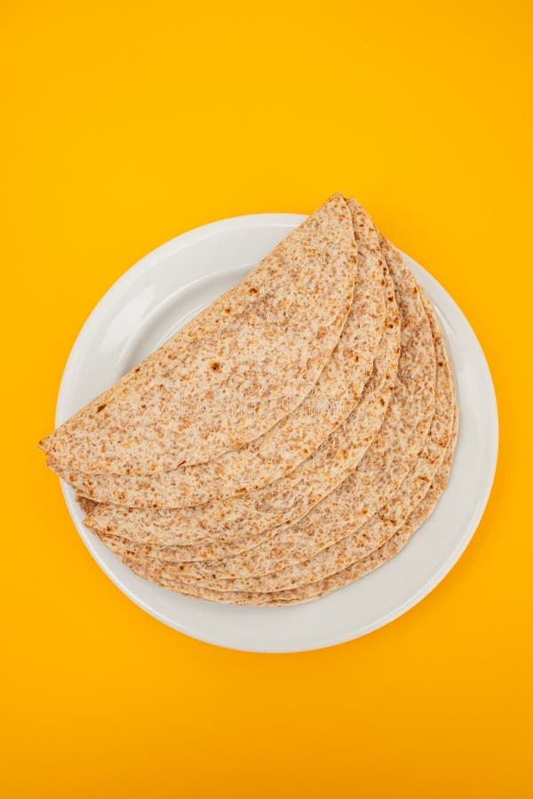 Whole Grain Tortilla Wraps on White Plate Stock Photo - Image of tasty ...