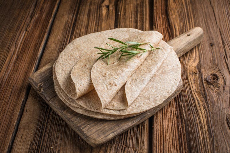 Whole Grain Tortilla Wraps on Wooden Table Stock Photo - Image of meal ...