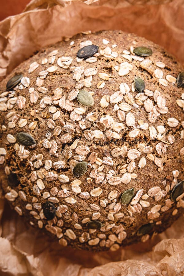 Whole Grain Rye Bread in Parchment Paper Stock Image - Image of food ...
