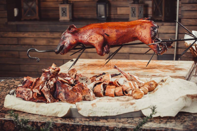 Whole Grilled Pig with Meat Steak on Cutting Board. Hot Meat. Stock ...