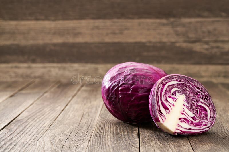 Whole and Half Purple Cabbage on a Wooden Table, Copy Space for Text ...