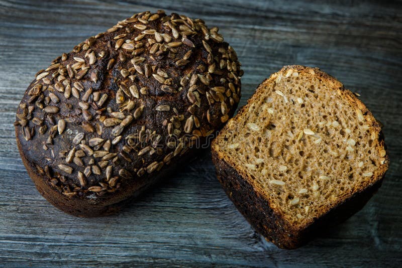 Whole and Half of Tasty Homemade Rectangular Black Bread Stock Image ...