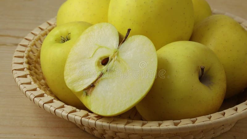 Whole and Halved Fresh Yellow Apples in a Basket Stock Video - Video of ...