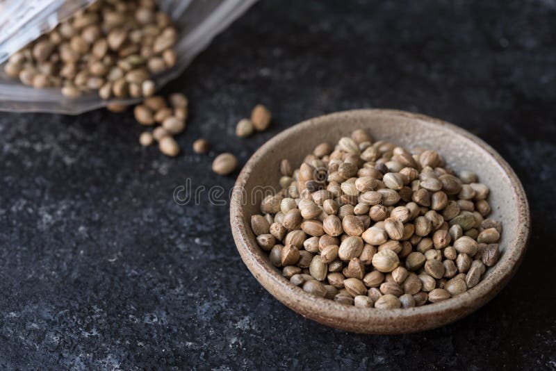 Whole Hemp Seeds in a Bowl stock image. Image of ingredient - 152073169