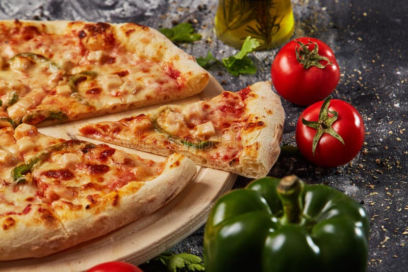 Whole Italian Pizza on Wood Table with Ingredients Stock Image - Image ...
