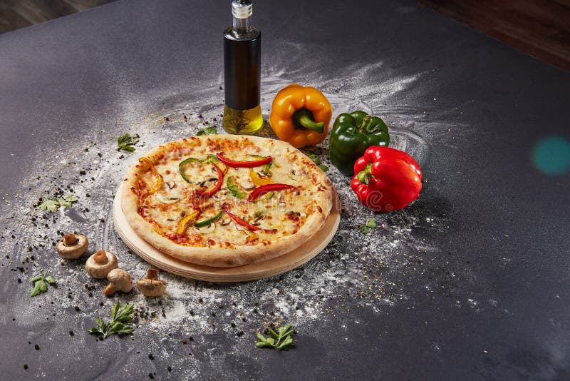 Whole Italian Pizza on Wood Table with Ingredients Stock Image - Image ...