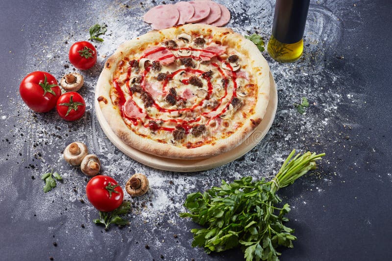 Whole Italian Pizza on Wood Table with Ingredients Stock Image - Image ...