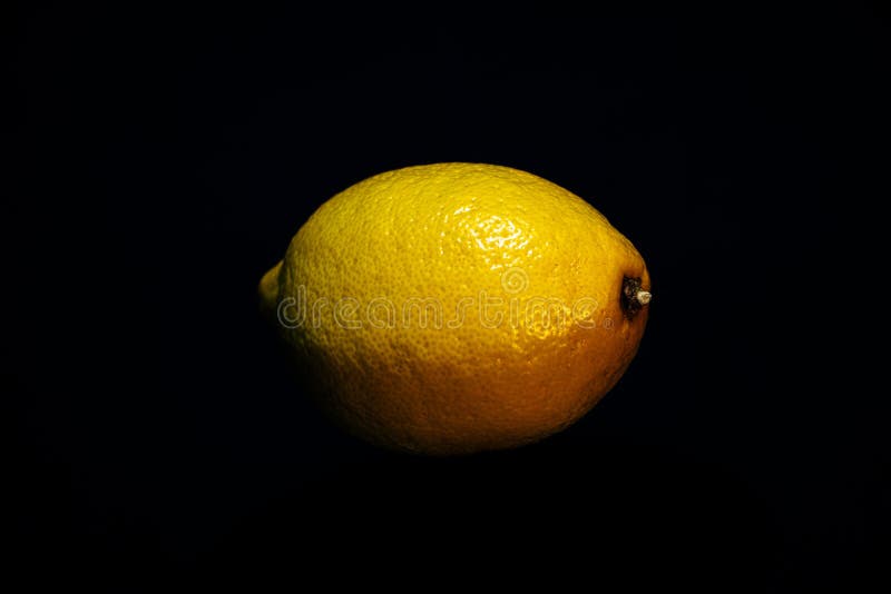 Whole Lemon on Black Background Stock Photo - Image of concept ...