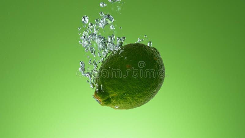 Whole Lime Falling into Water Stock Image - Image of motion, closeup ...