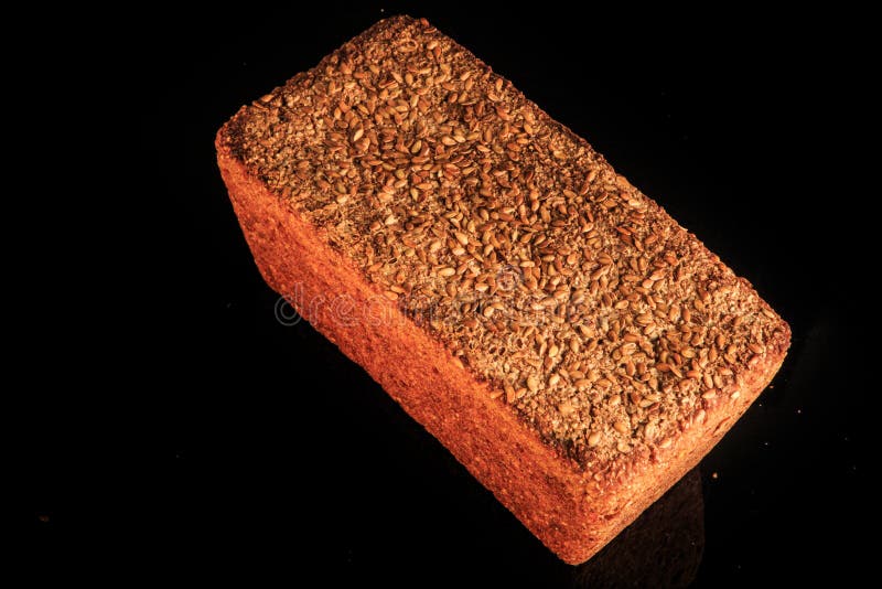 Whole Loaf of Rectangular Rye Bread with Sesame Seeds Stock Photo ...