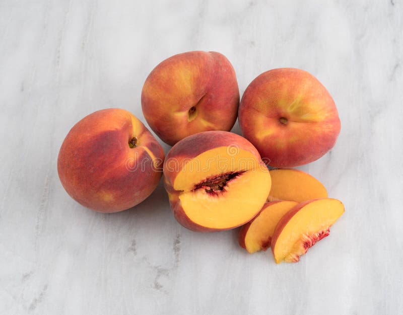 Whole Nectarines with a Slice on a Cutting Board. Stock Image - Image ...