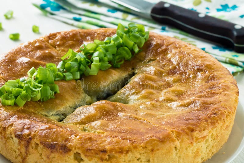 A Whole Pie on a White Plate Stock Image - Image of gourmet, lettuce ...