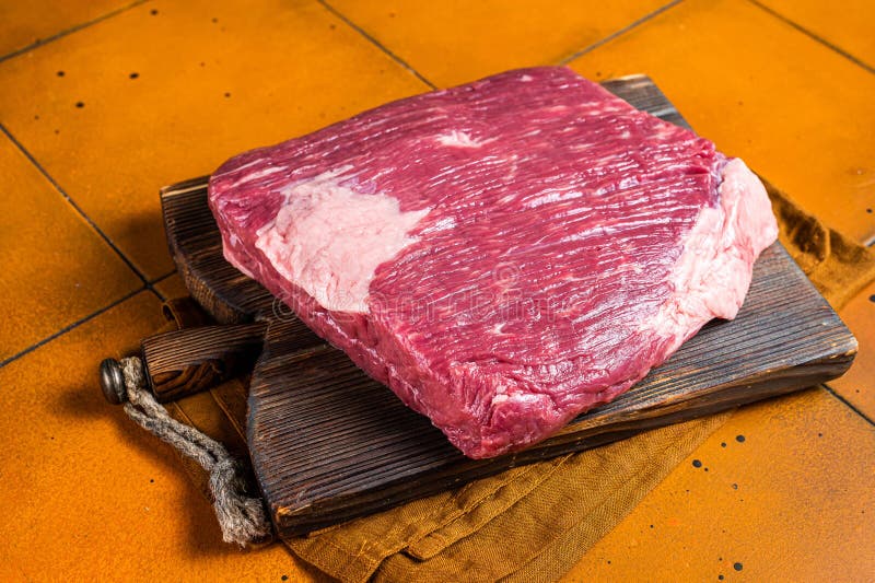 Whole Piece of Raw Beef Brisket Meat. Orange Background Stock Image ...