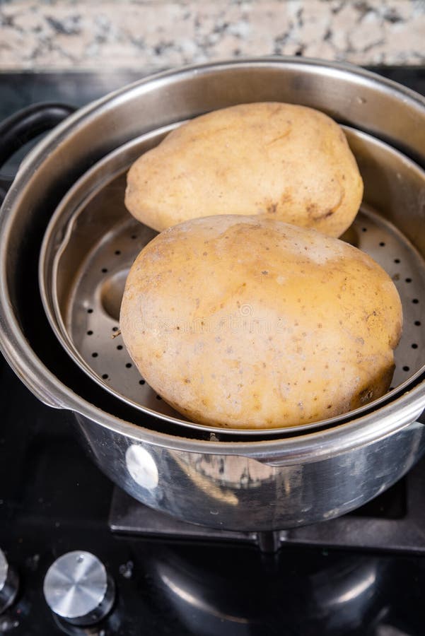 Steam boiled potatoes stock photo. Image of cooker, wholesome - 104665468