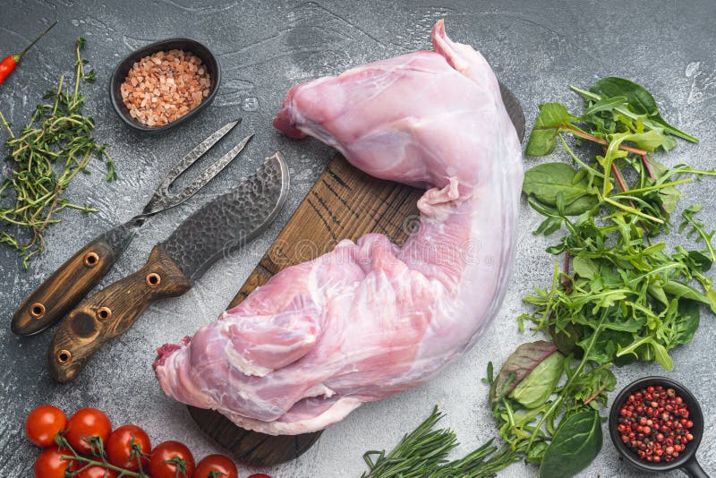 Whole Raw Rabbit with Ingredients, on Gray Stone Background, Top View ...