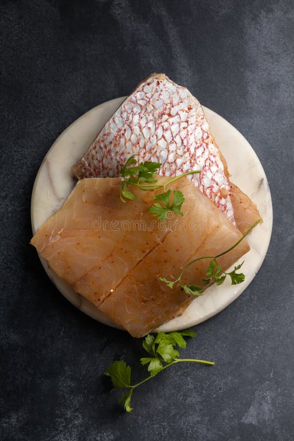 Whole Raw Red Snapper Fish on a Cutting Board Stock Photo - Image of ...